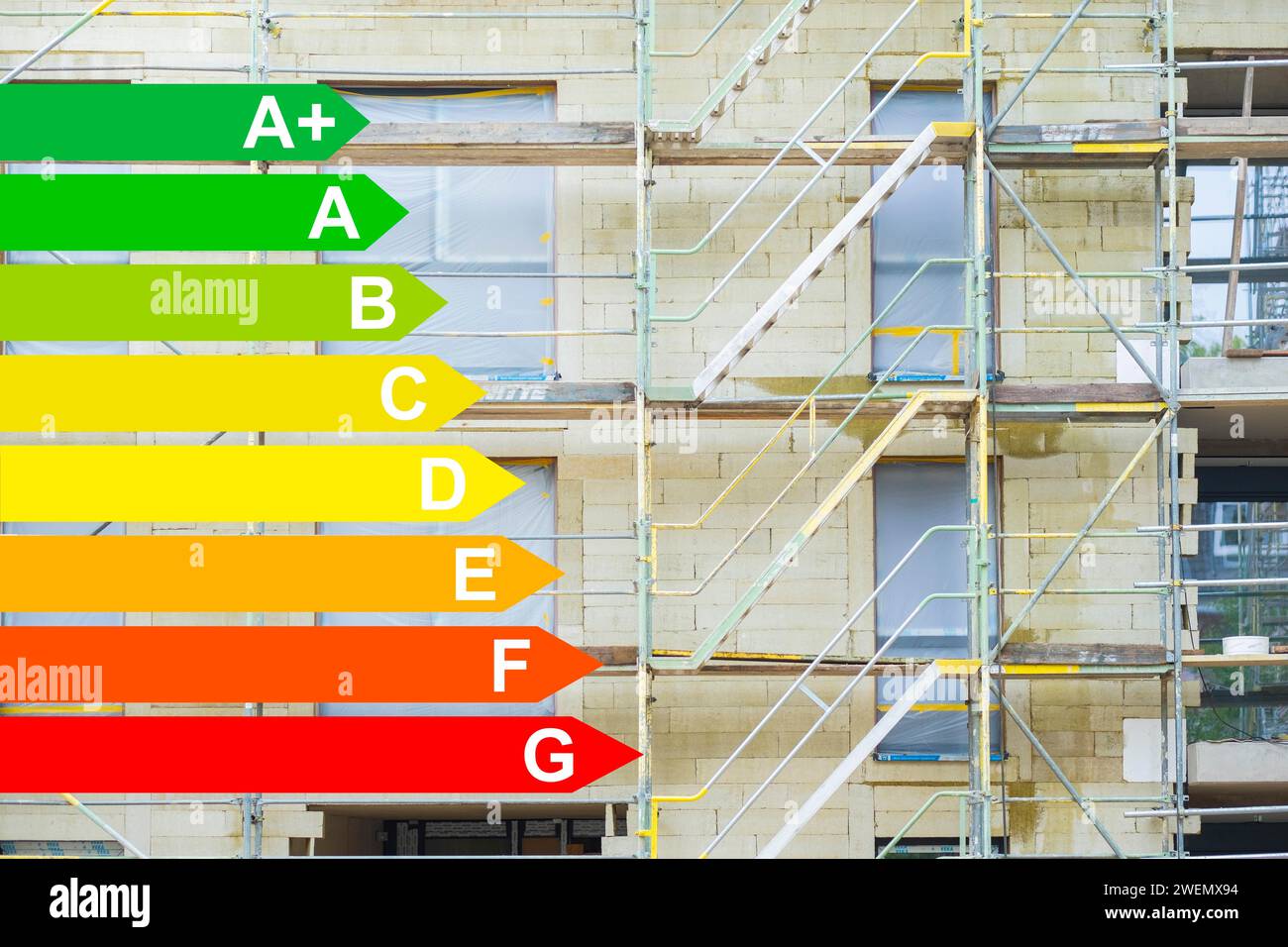 Insulation of a facade with mineral fibre boards, graphic with energy ...