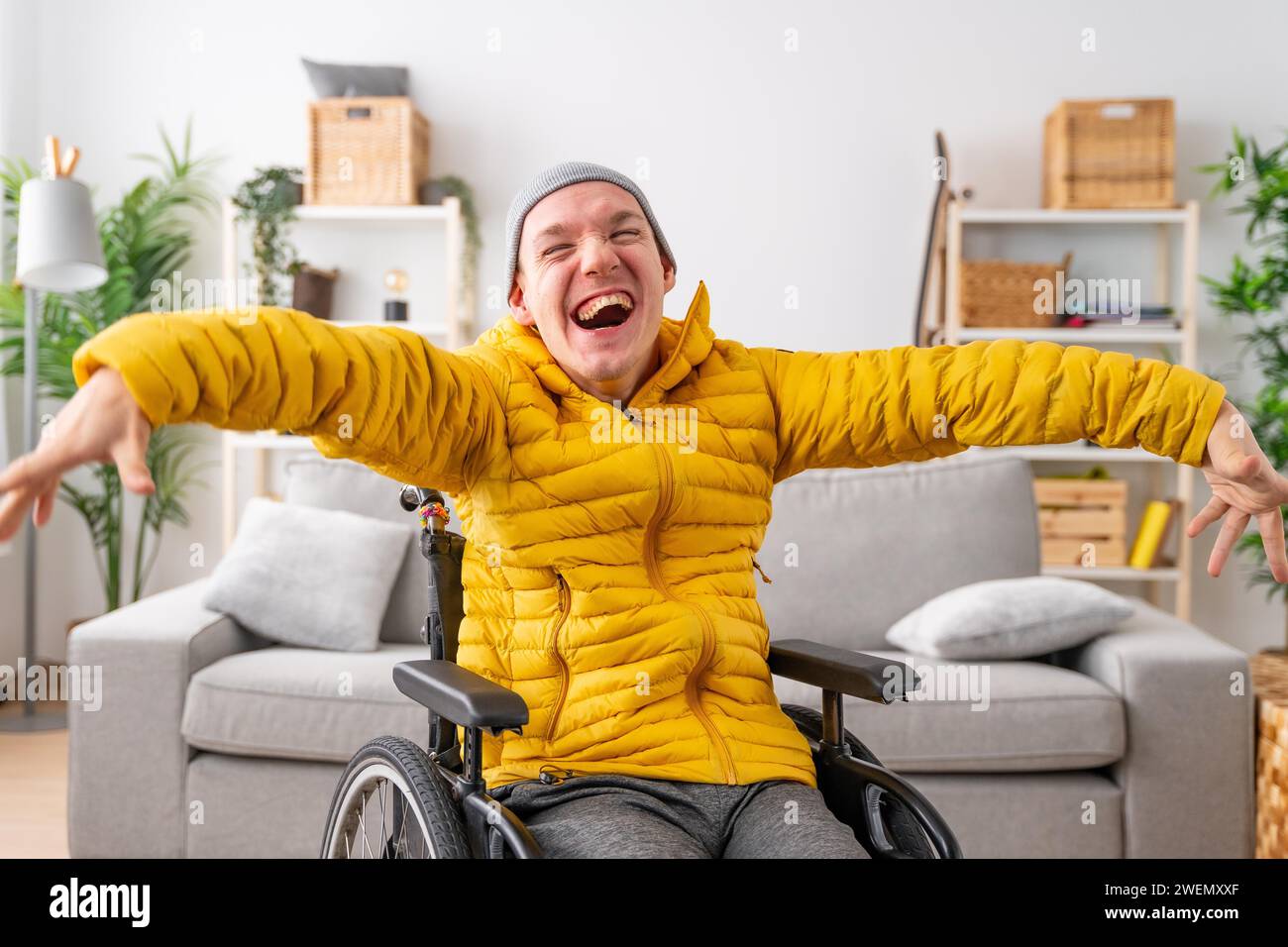Portrait of a happy moment of a cheerful disabled man in wheelchair ...