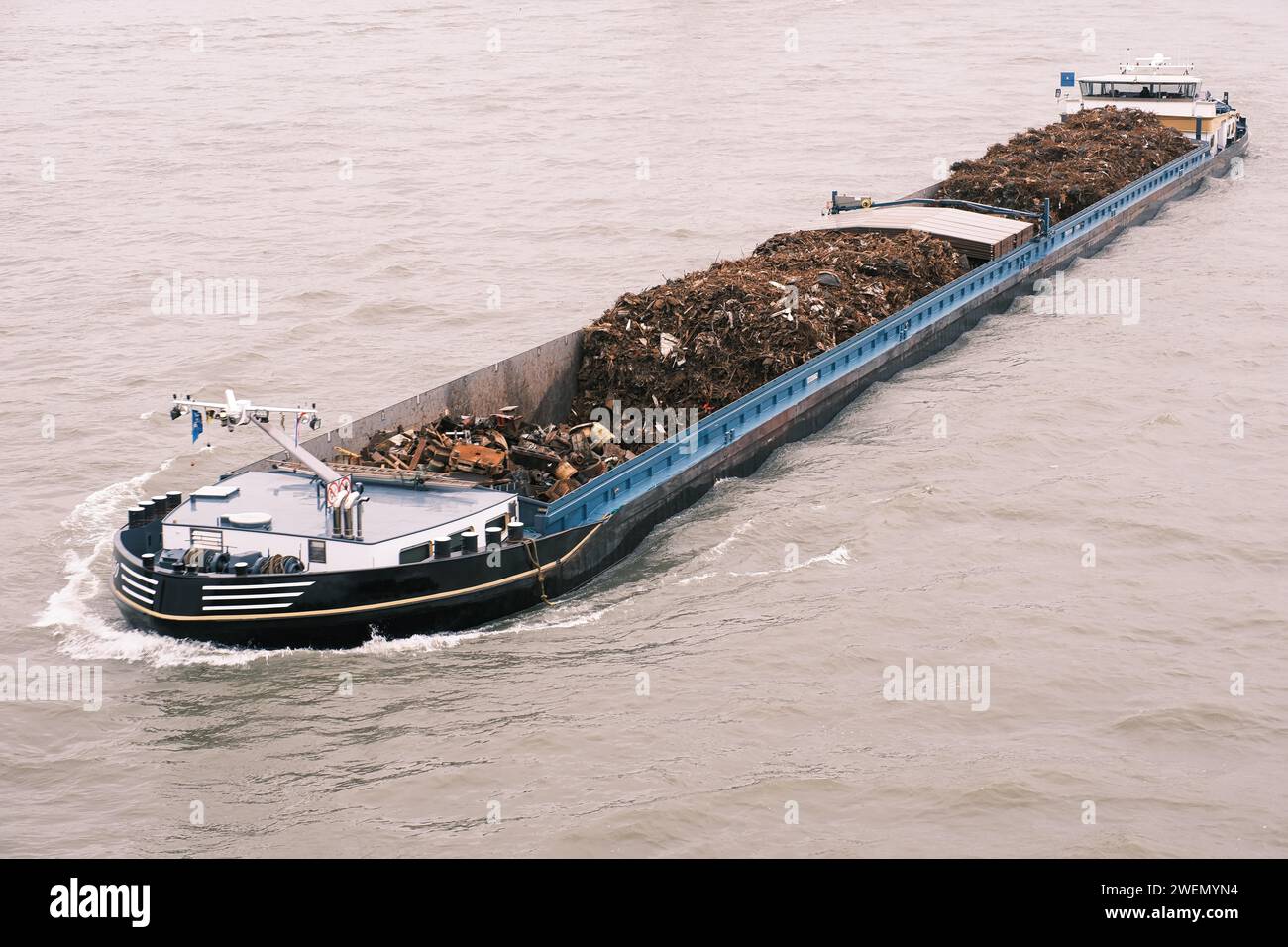Cargo ship with scrap metal on the Rhine, Cologne, Germany Stock Photo ...