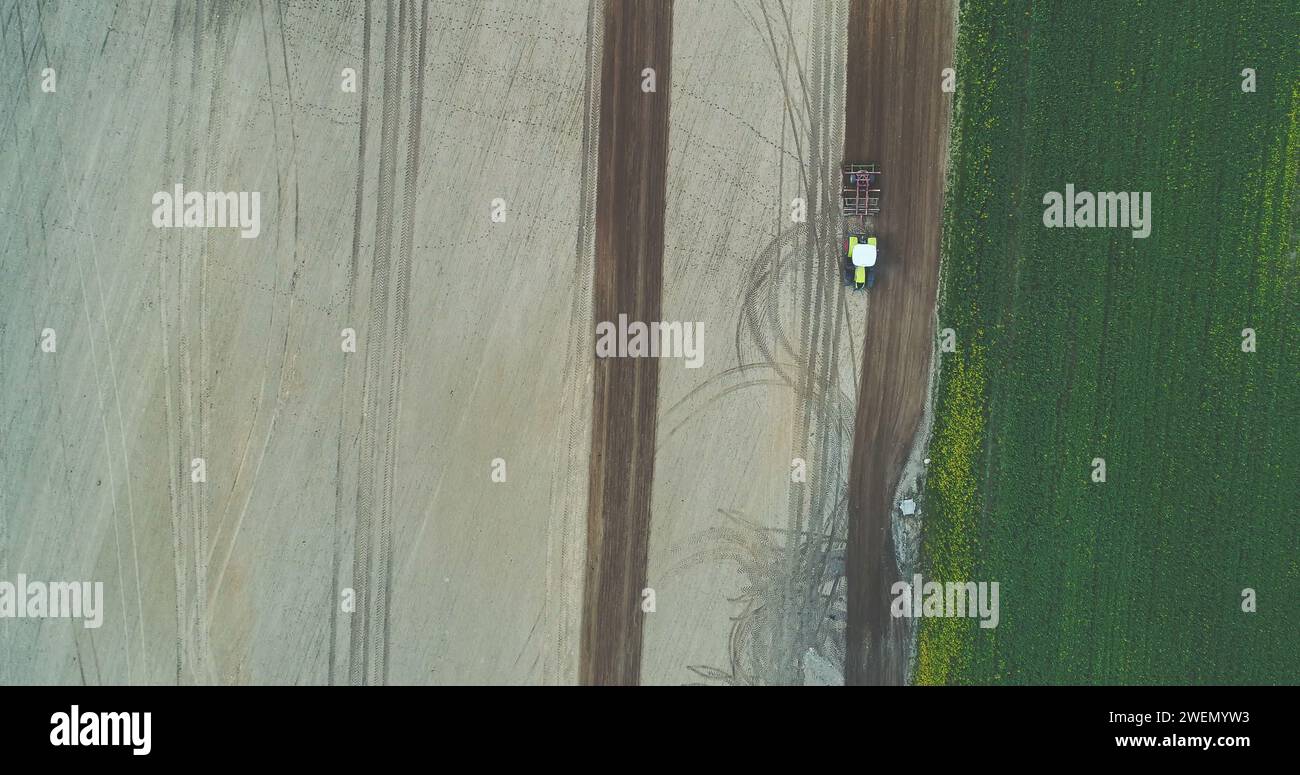 Tractor Plowing Field Stock Photo - Alamy