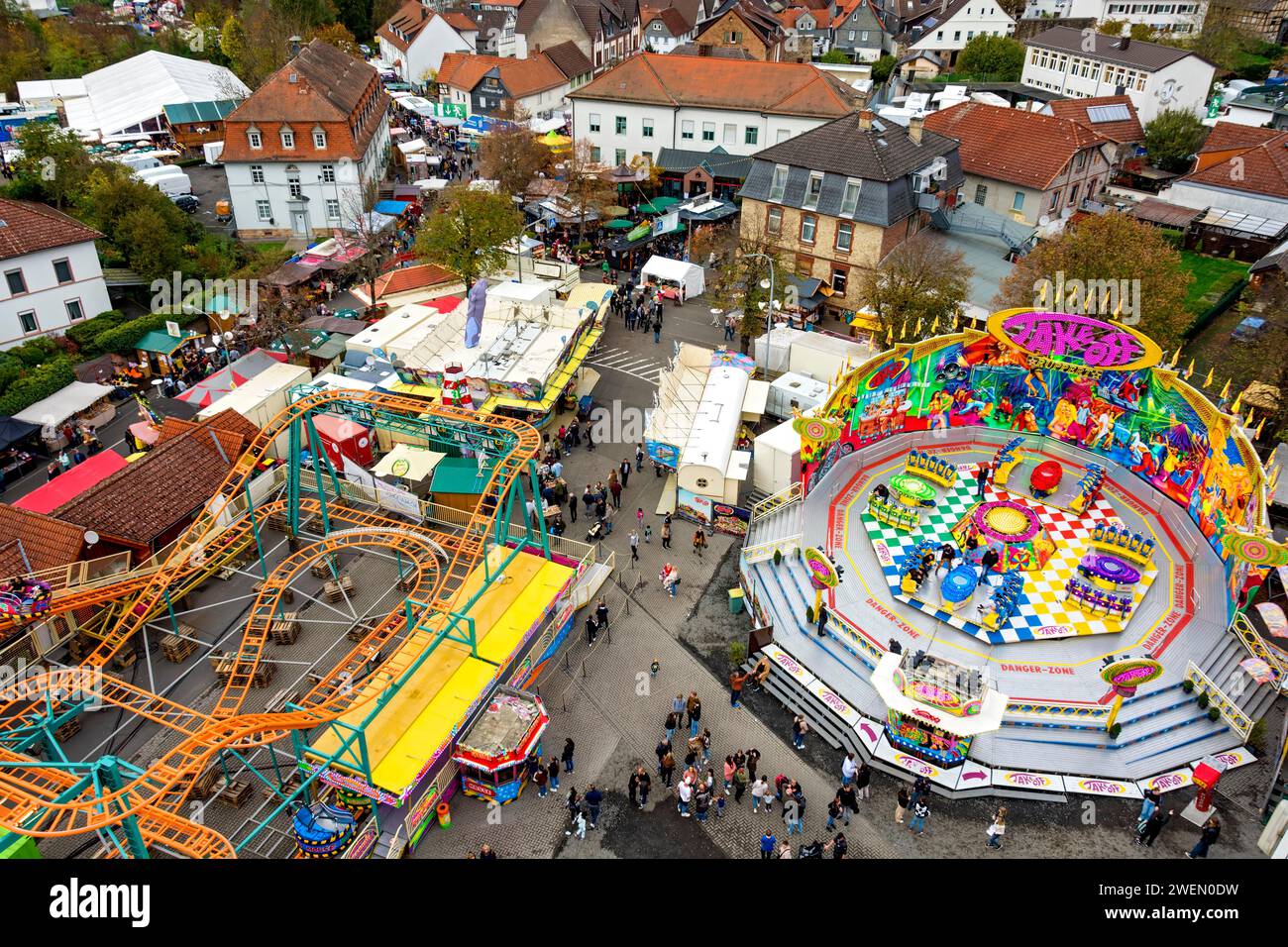 Fairground rides, market stalls and booths, Kalter Markt folk festival ...