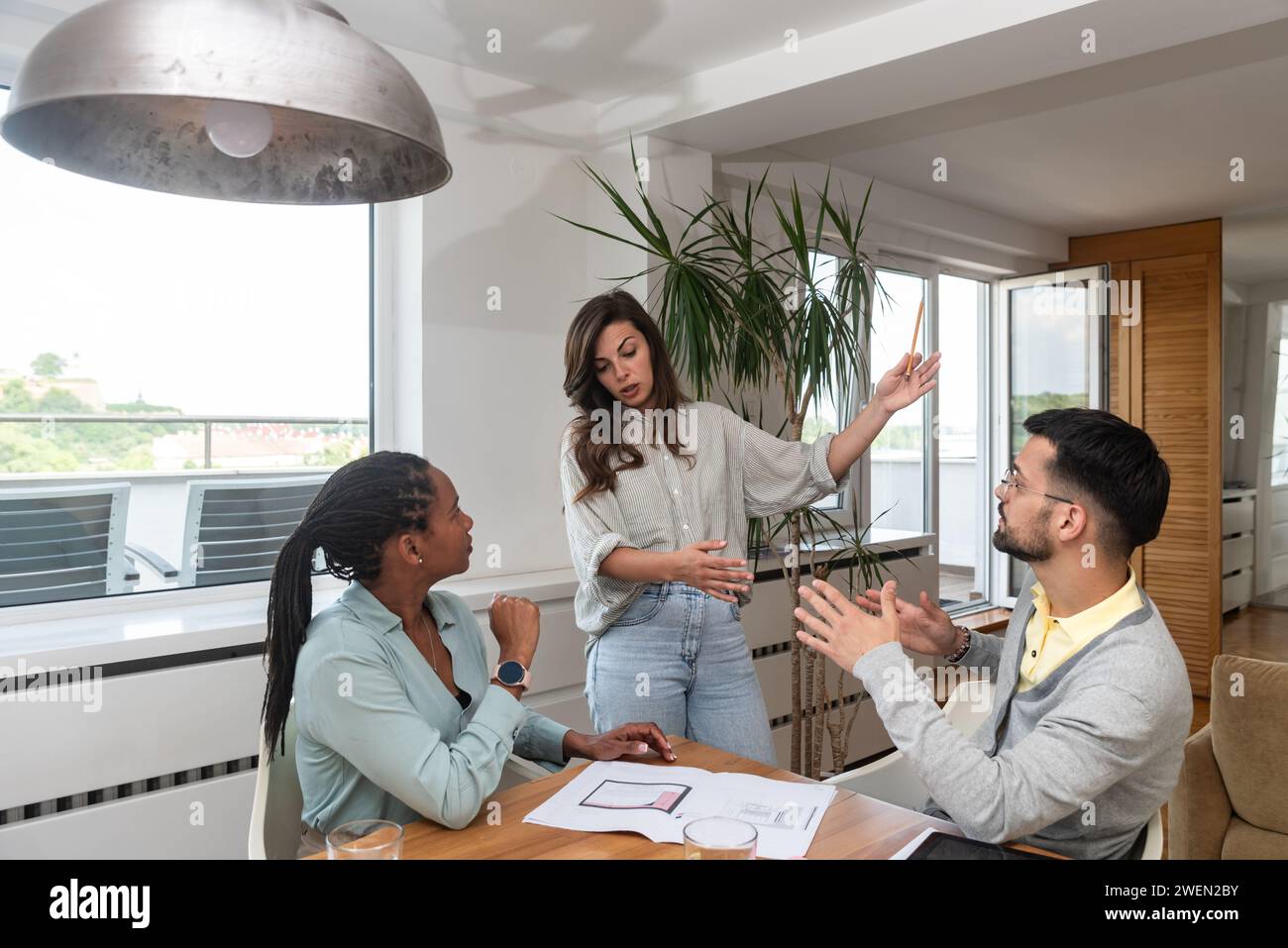 Group of young business people interior and exterior designers ...