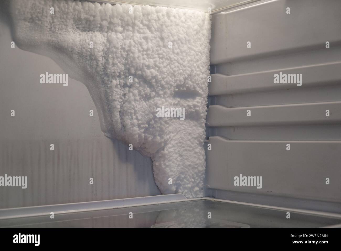 Frozen refrigerator that needs to be defrosted Stock Photo - Alamy