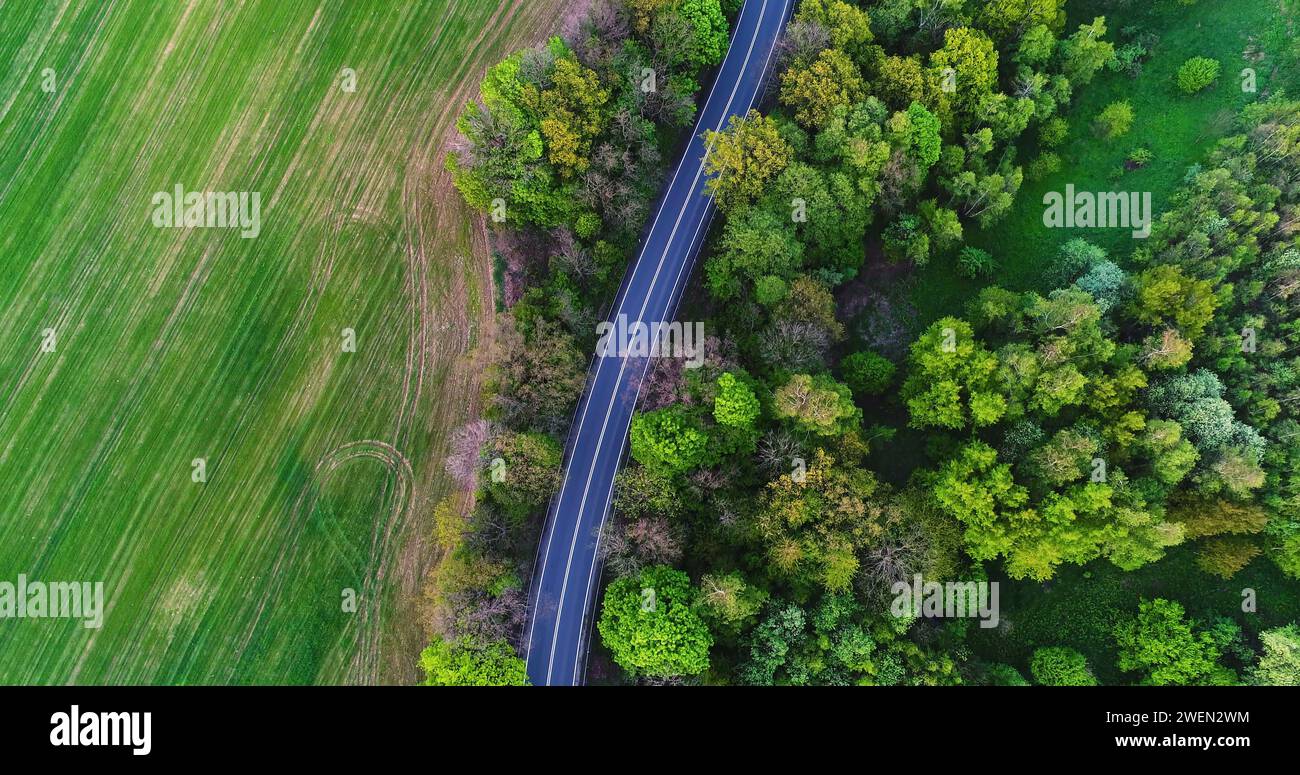 Car passing highway aerial view Stock Photo - Alamy