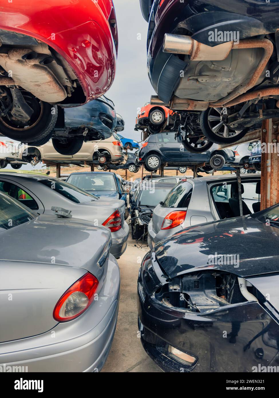 Car scrapping center. Stacked cars Stock Photo - Alamy