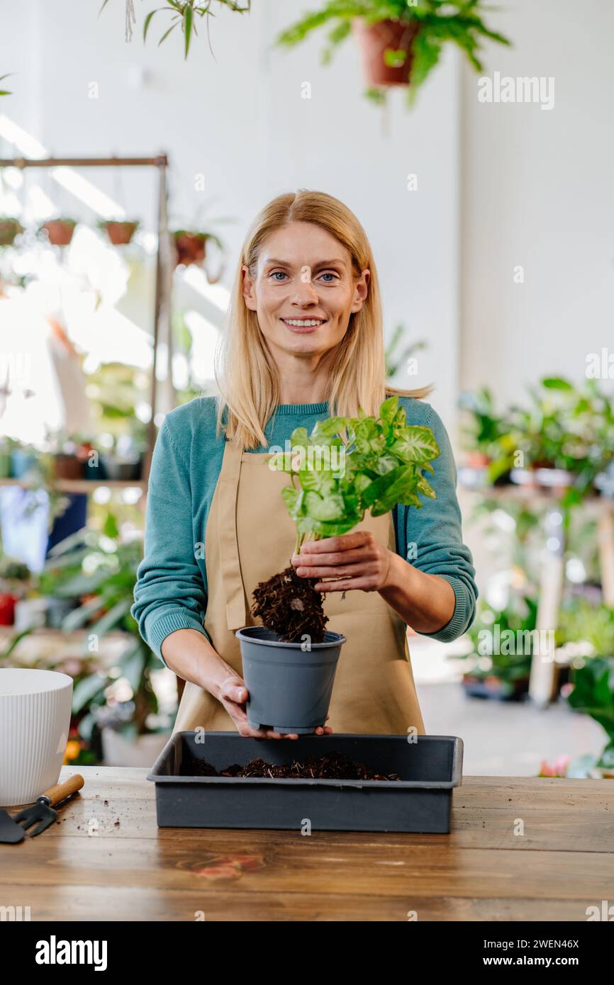 Interior Greenery, Portrait of Blonde Enthusiast Seamlessly Integrates ...