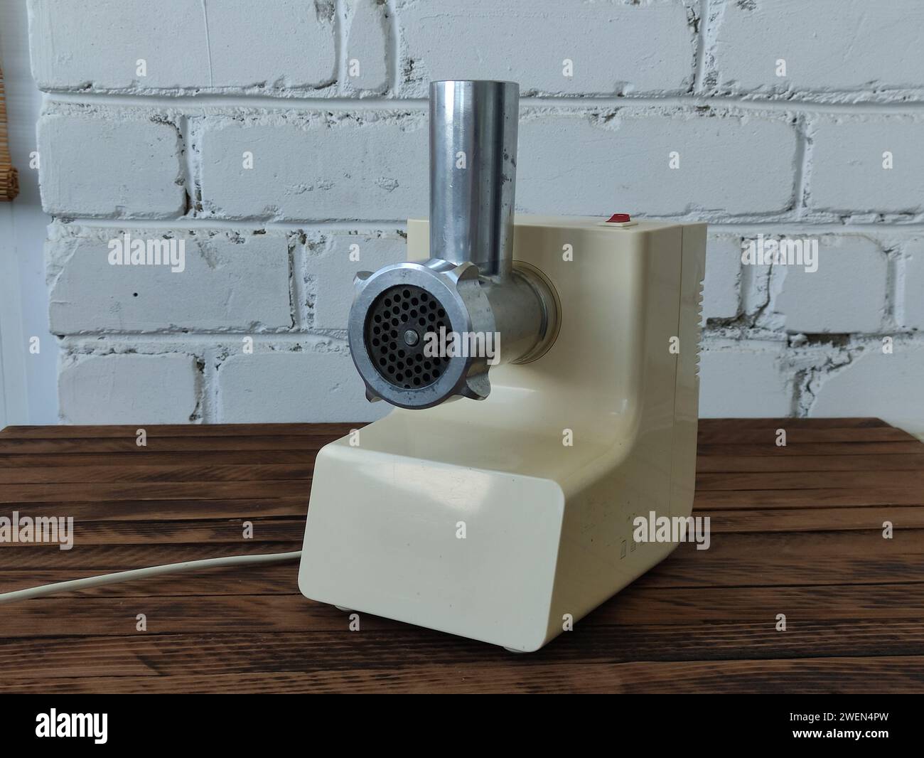 Minced meat on electric grinder hi-res stock photography and images - Alamy