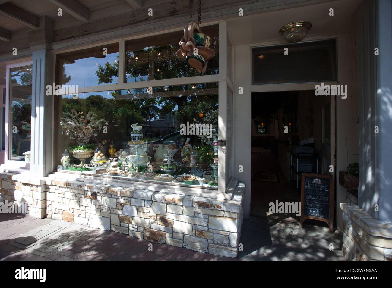 Storefronts along the sidewalk of Carmel By The Sea, Monterey ...