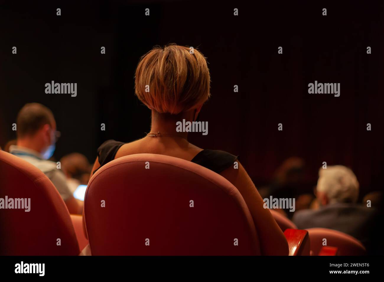 Auditorium full people watching show hi-res stock photography and ...
