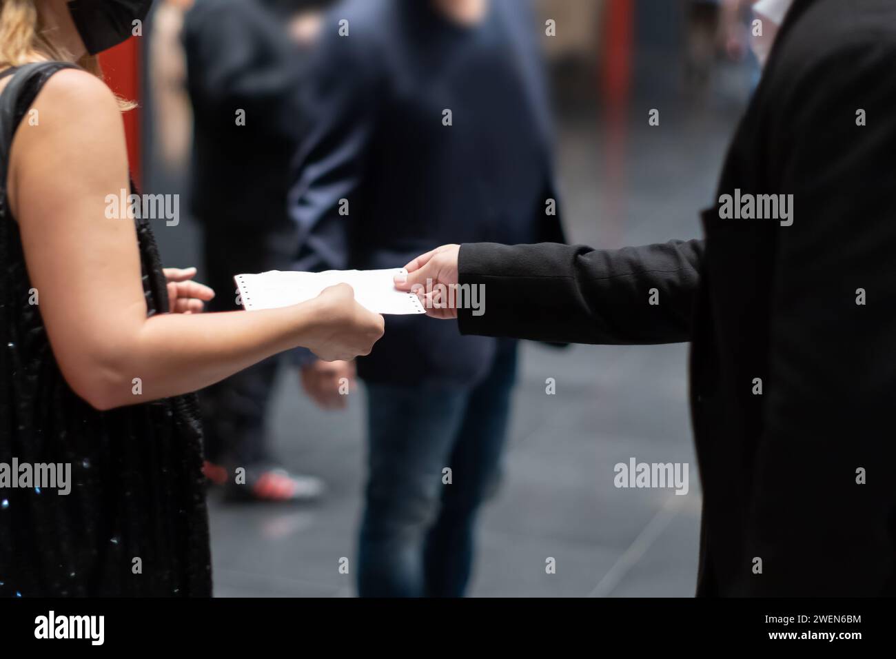 ticket check before entering opera Stock Photo - Alamy