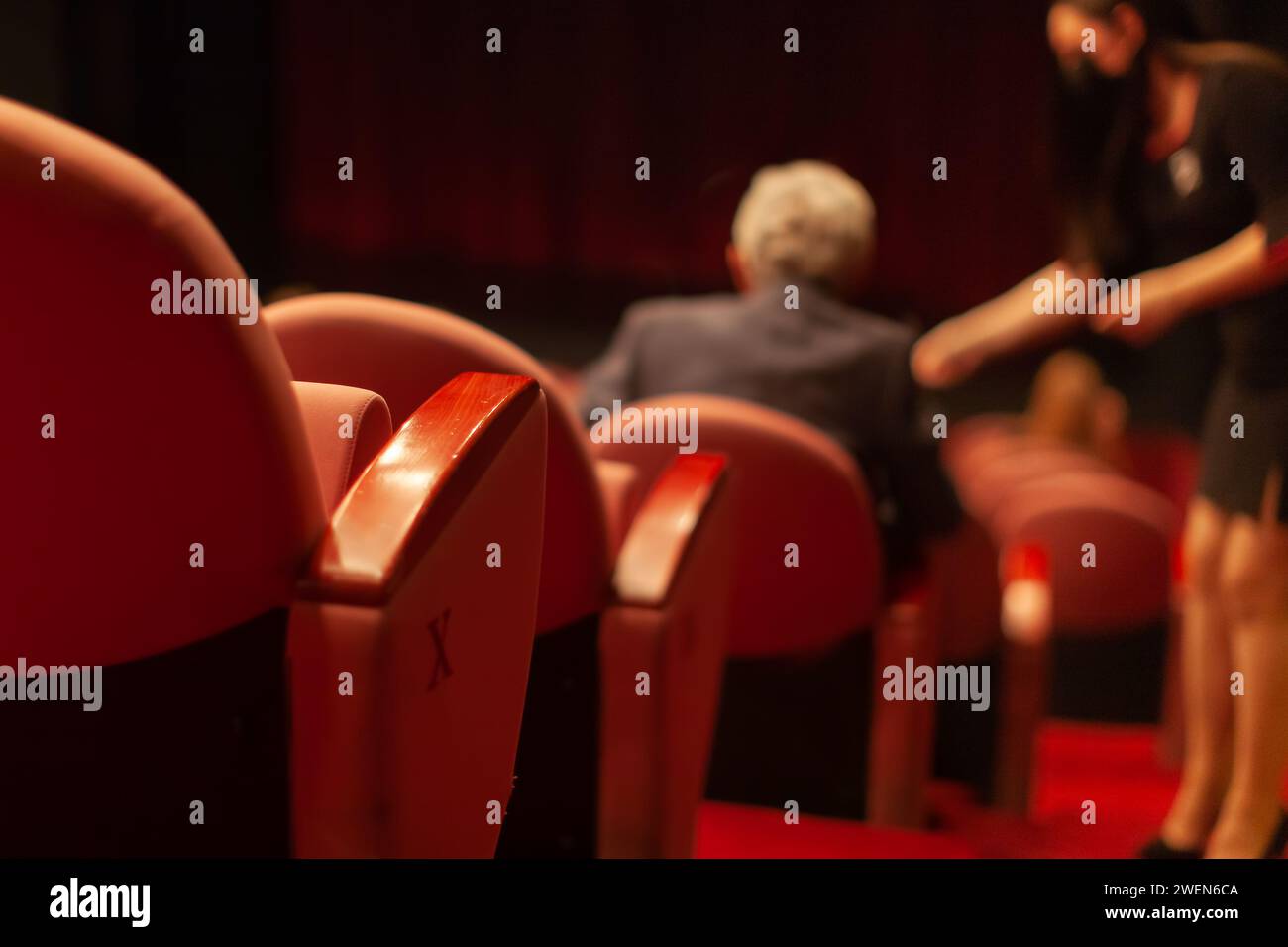 theater audience taking a seat before performance Stock Photo - Alamy