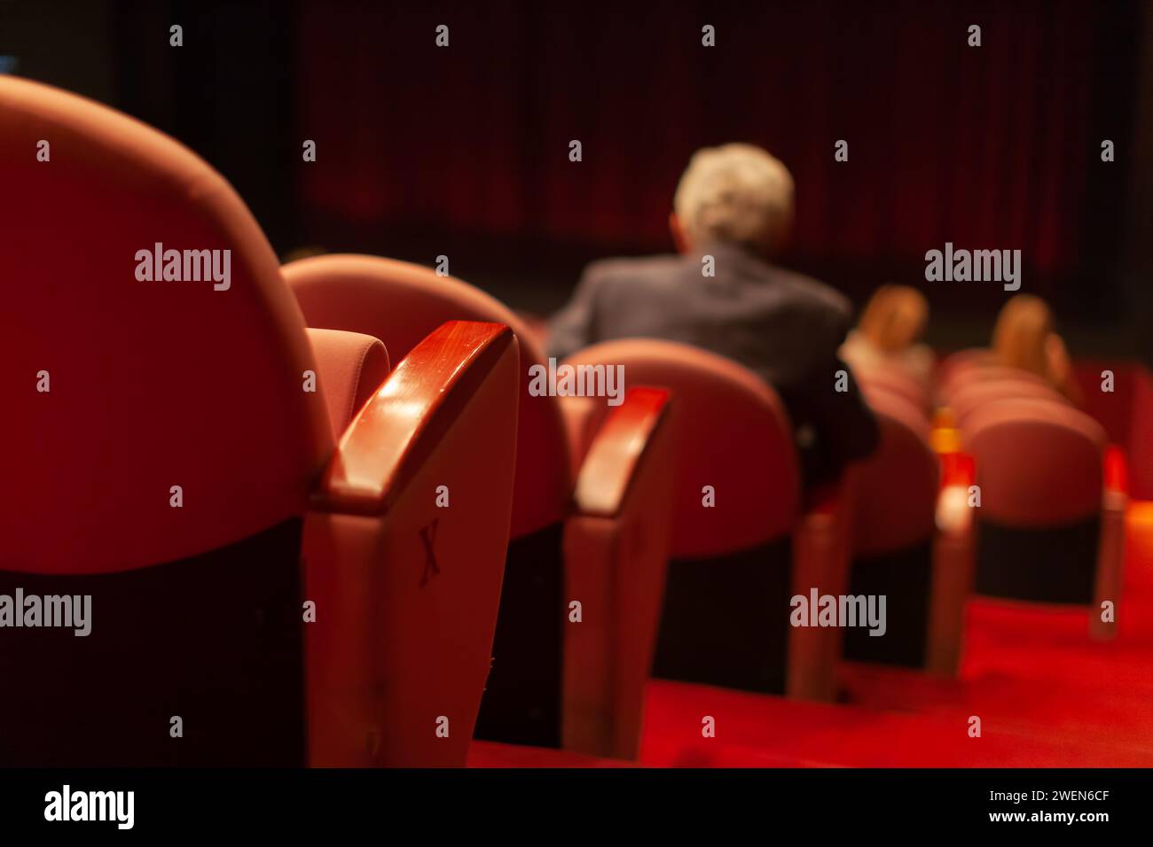 audience taking a seat before performance Stock Photo - Alamy