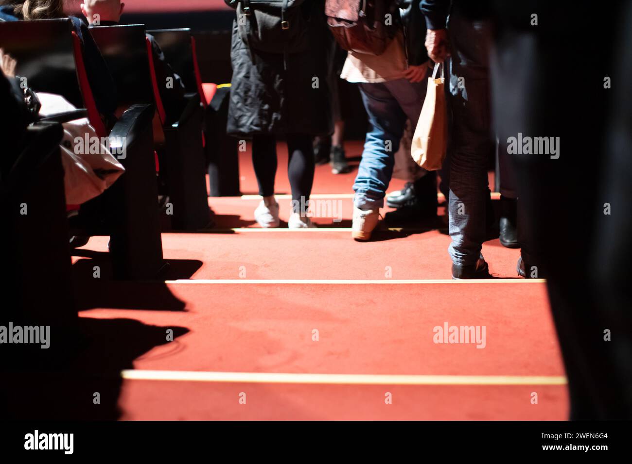 audience taking seats before theatre performance Stock Photo - Alamy