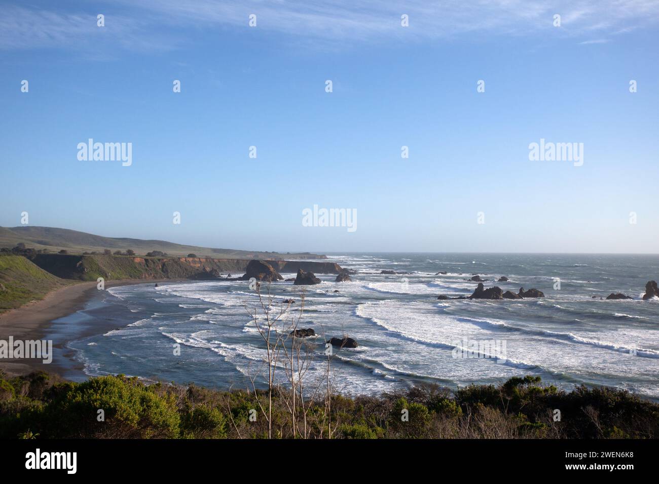 Beach landscape along the Pacific Coast Highway PCH with crashing waves ...