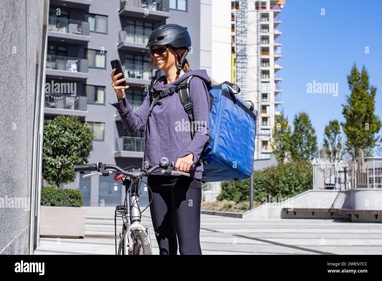 woman delivery person taking order Stock Photo - Alamy