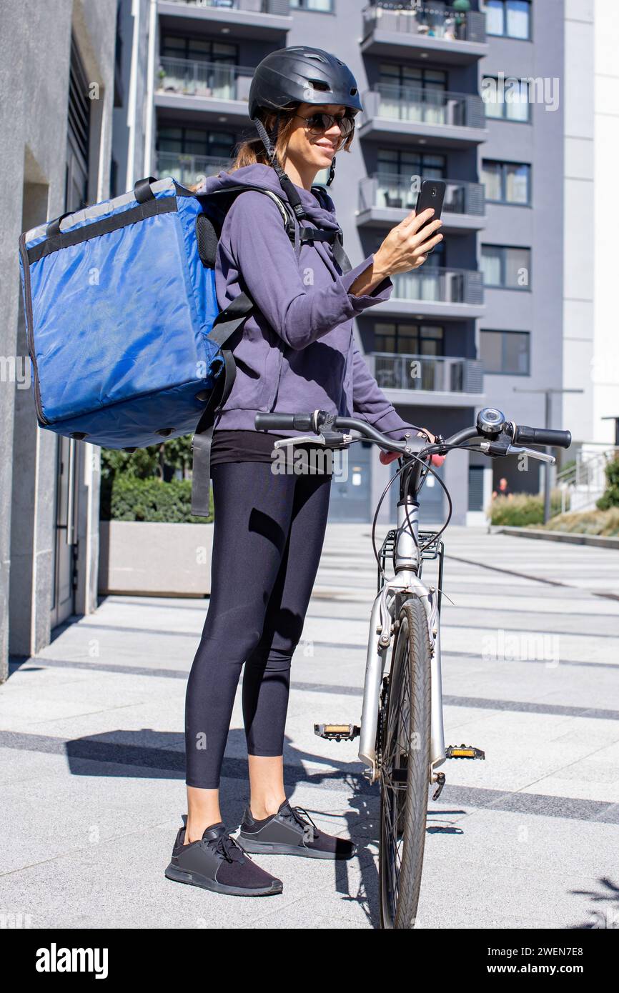 Delivery service application woman hi-res stock photography and images ...