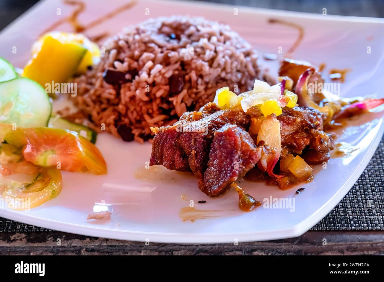 Pork meat and congri rice, cuban cuisine Stock Photo - Alamy