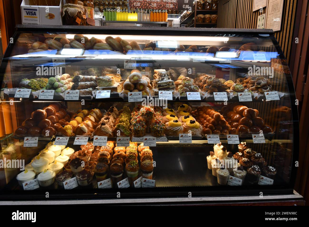 A food shop in a street of the historic district of Naples, Italy Stock ...