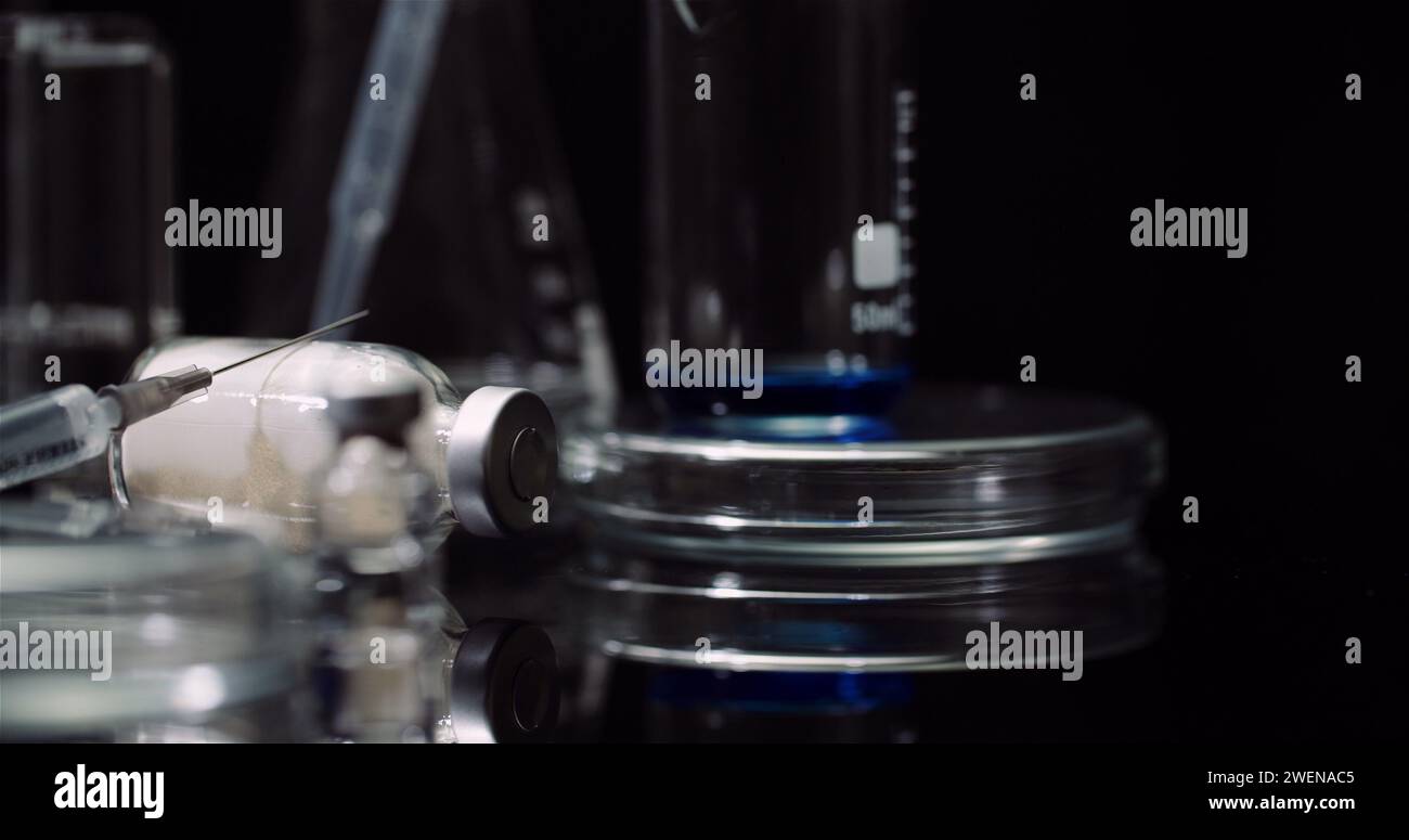 Laboratory Equipement: Syringe and Medicine, Test Tubes and Flasks ...