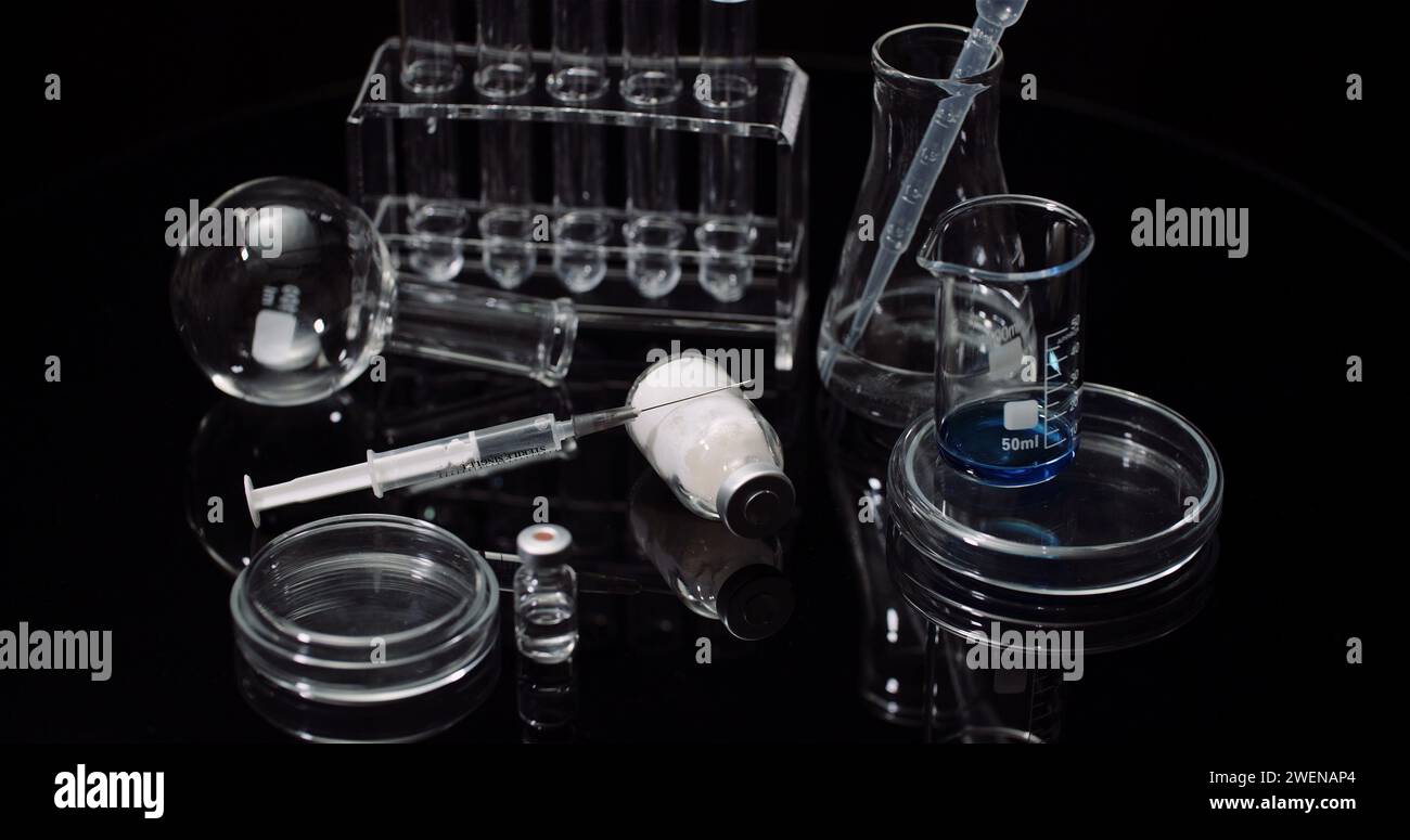 Laboratory Equipement: Syringe and Medicine, Test Tubes and Flasks ...