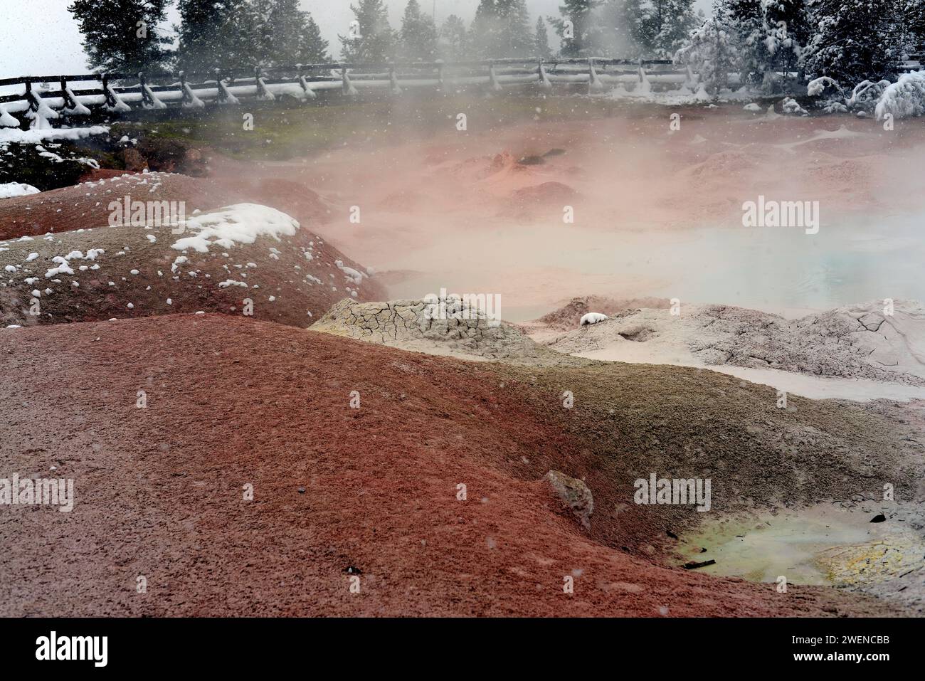 Geothermal pool in winter Yellowstone National Park steaming Stock ...