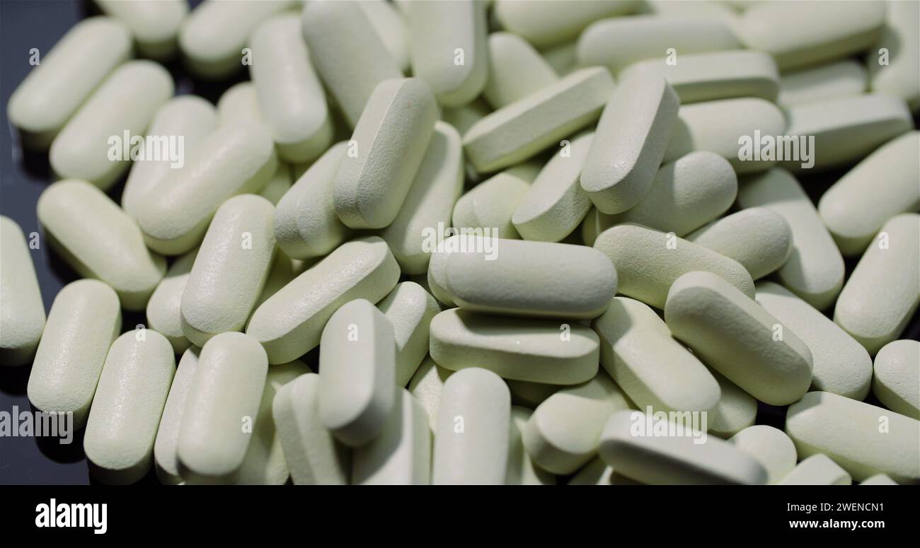 Medical tablets and pills rotating, pharmaceutical industry. Drugs ...