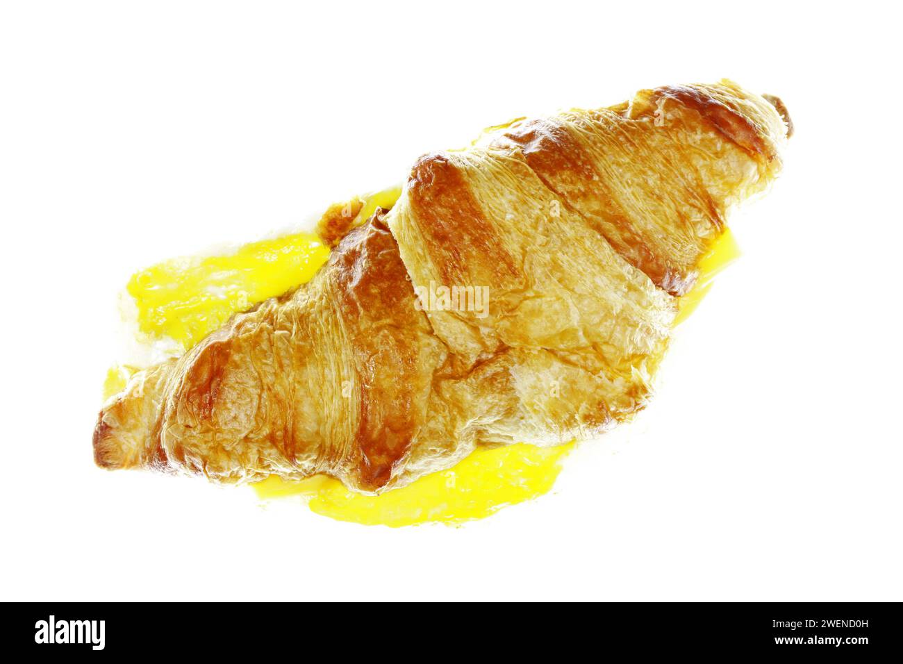 Crescent roll, croissant, with a fried egg, isolated on white Stock ...
