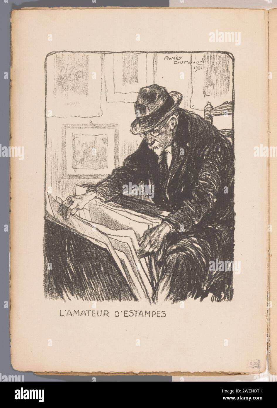 Man on a chair views a folder with prints, 1920 print paper art ...