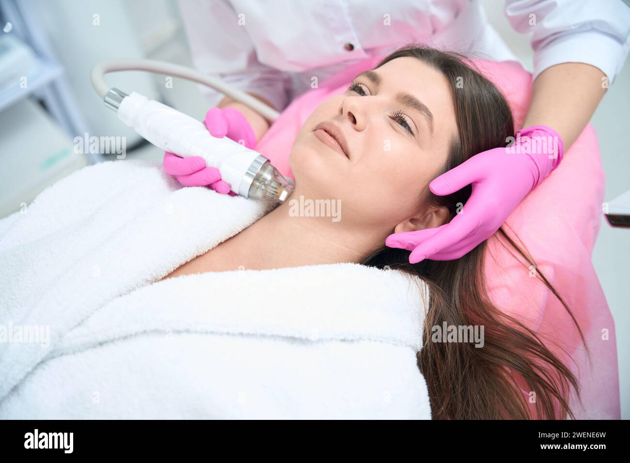 Professional procedure, woman working with customer in clinic Stock ...