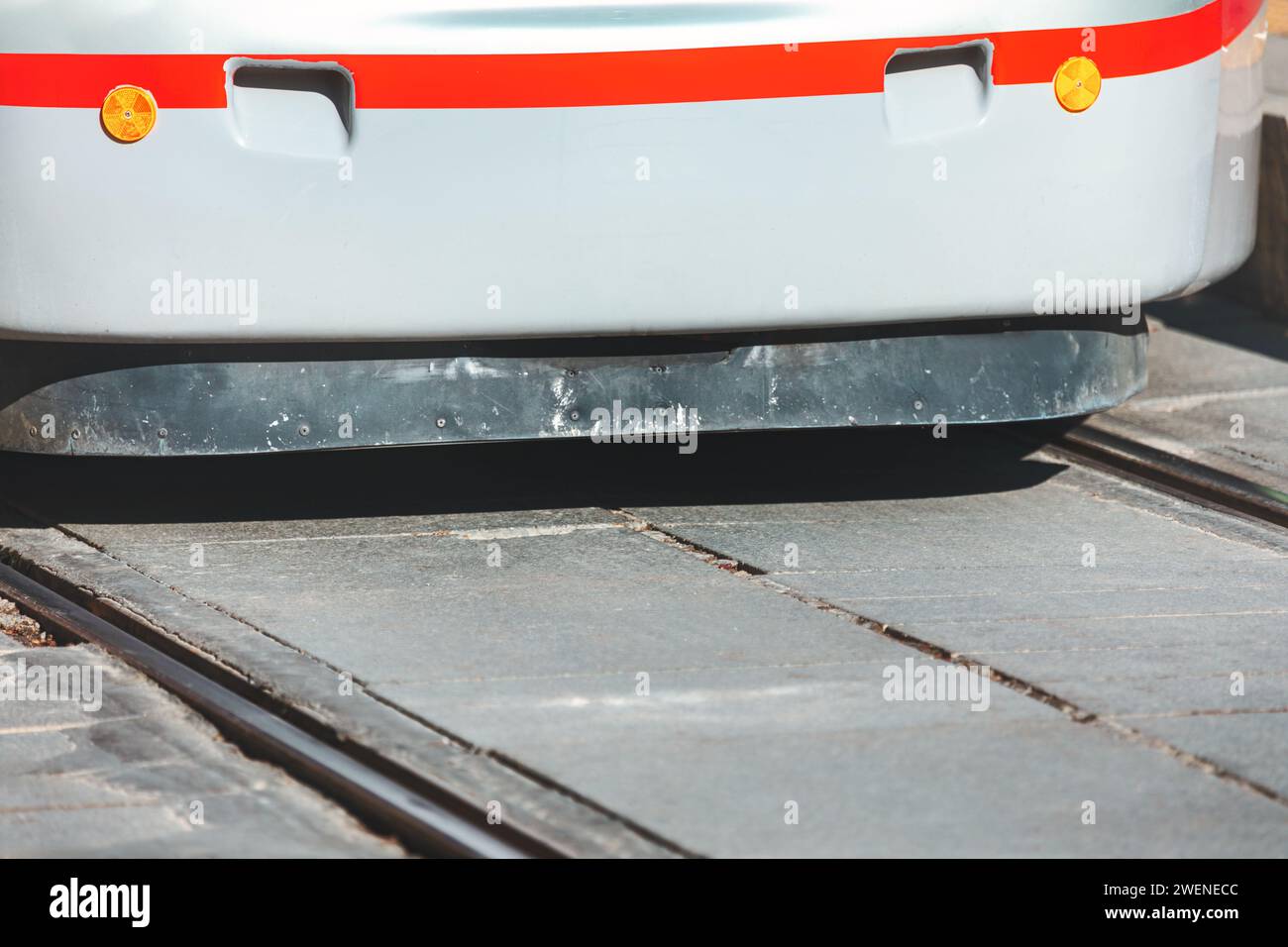 Details of a modern tram rails on the street. City tram for public ...