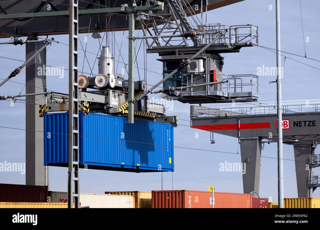 Munich, Germany. 26th Jan, 2024. Containers are loaded from freight ...