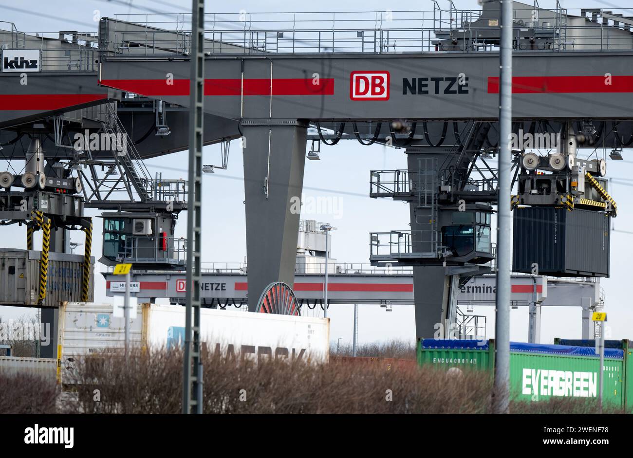 Munich, Germany. 26th Jan, 2024. Containers are loaded from freight ...