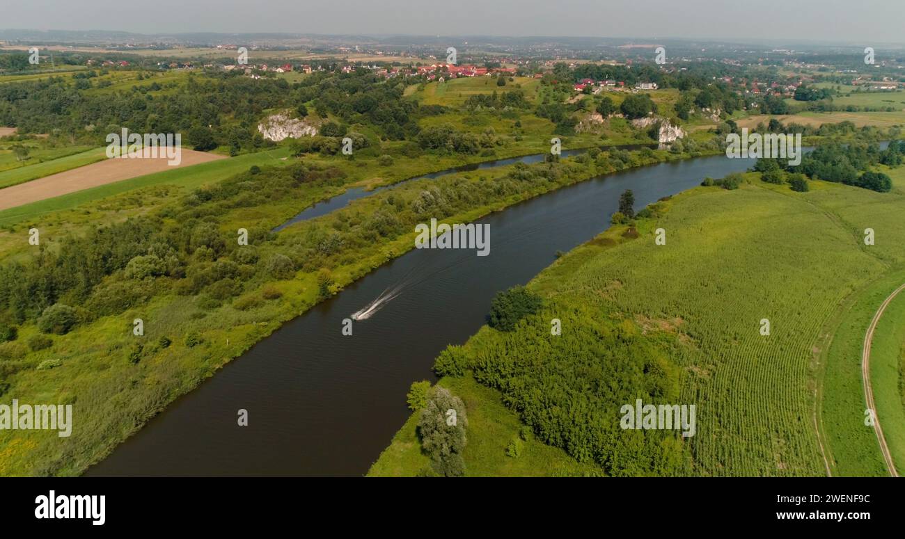 Aerial View of Motorboat swimming in river Stock Photo - Alamy
