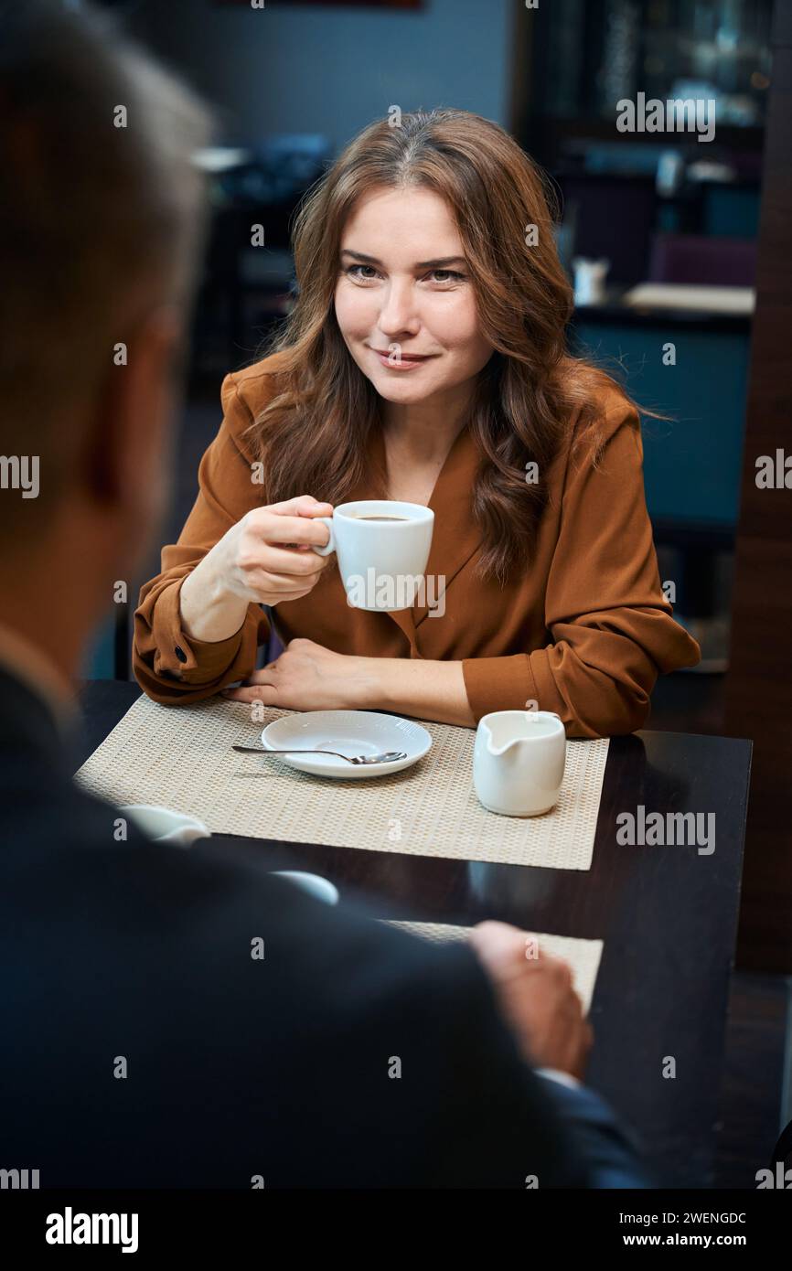Woman conversation cafe restaurant hi-res stock photography and images ...
