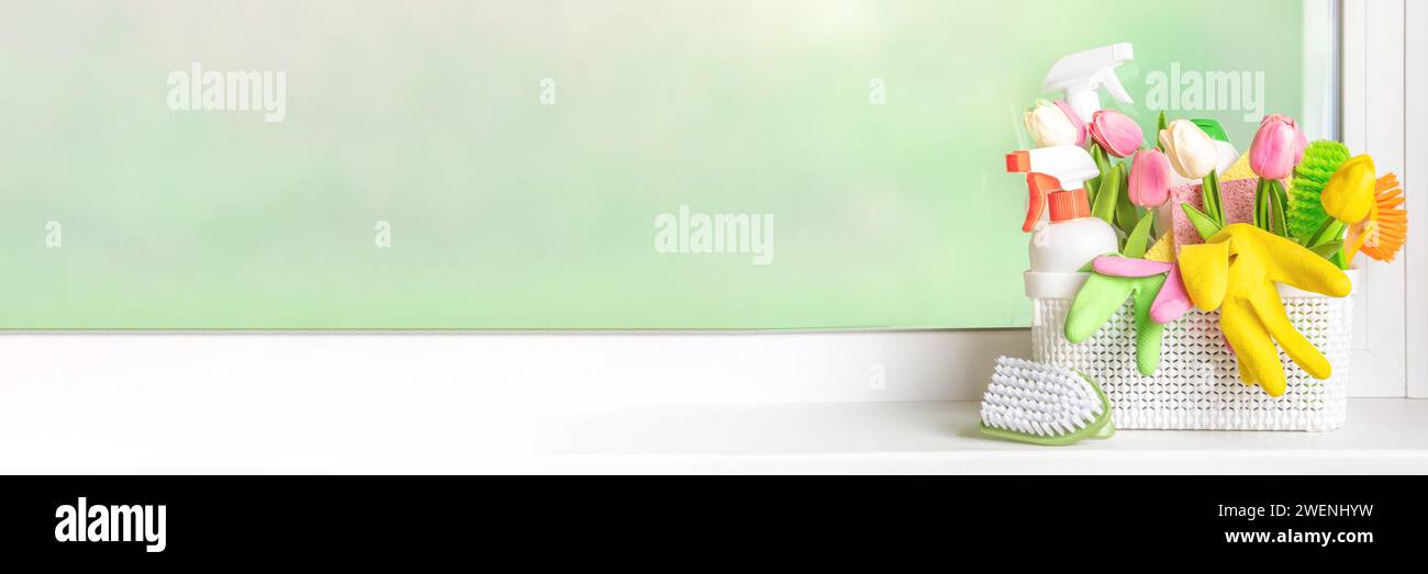 Spring cleaning background. Set of cleaning supplies, bottles ...