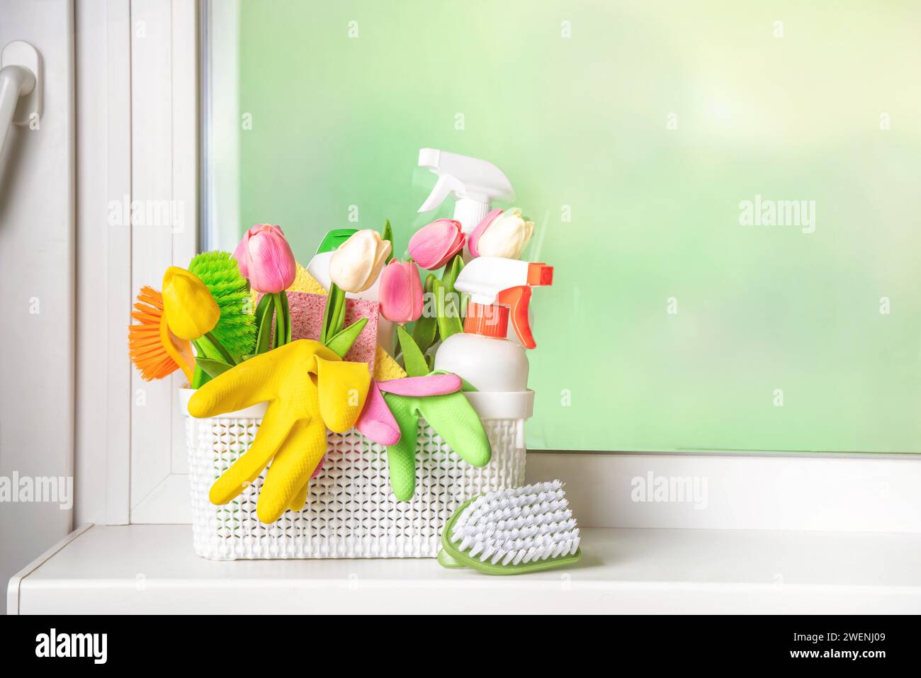 Spring cleaning background. Set of cleaning supplies, bottles ...
