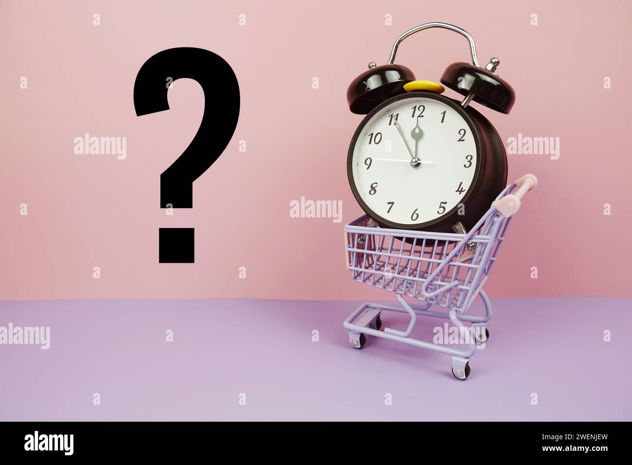 Question mark and alarm clock on yellow and purple background Stock ...