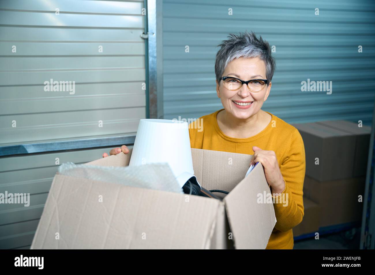Two hands holding packing hi-res stock photography and images - Alamy