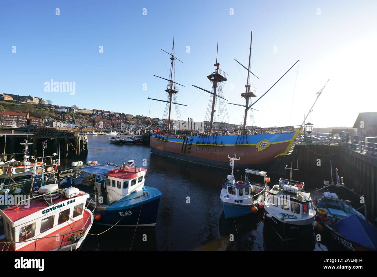 A replica of Captain James Cook's HMS Endeavour moored in Whitby ...