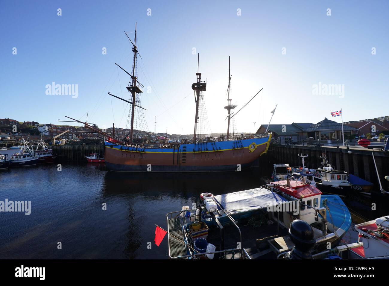 A replica of Captain James Cook's HMS Endeavour moored in Whitby ...