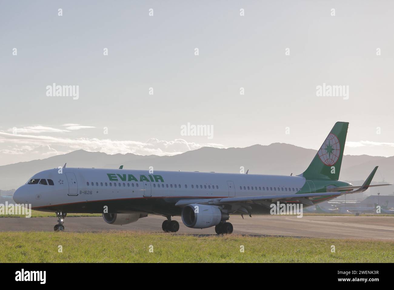B-16216 EVA AIR AIRBUS A321 on the runway is going to take off from ...