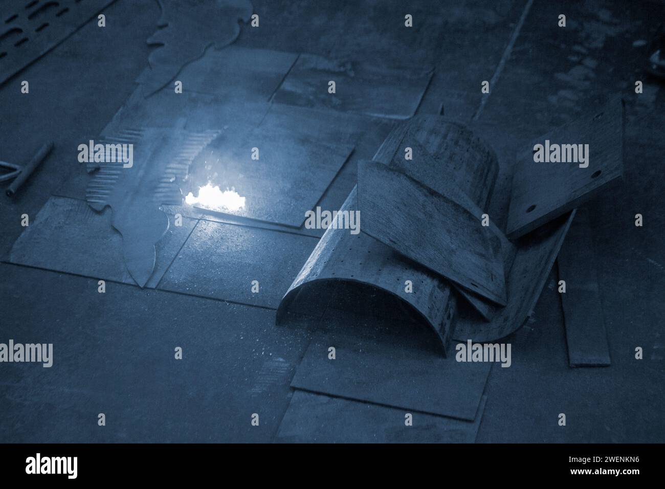 Laser cleaning of metal. The laser beam cleans the metal surface from ...