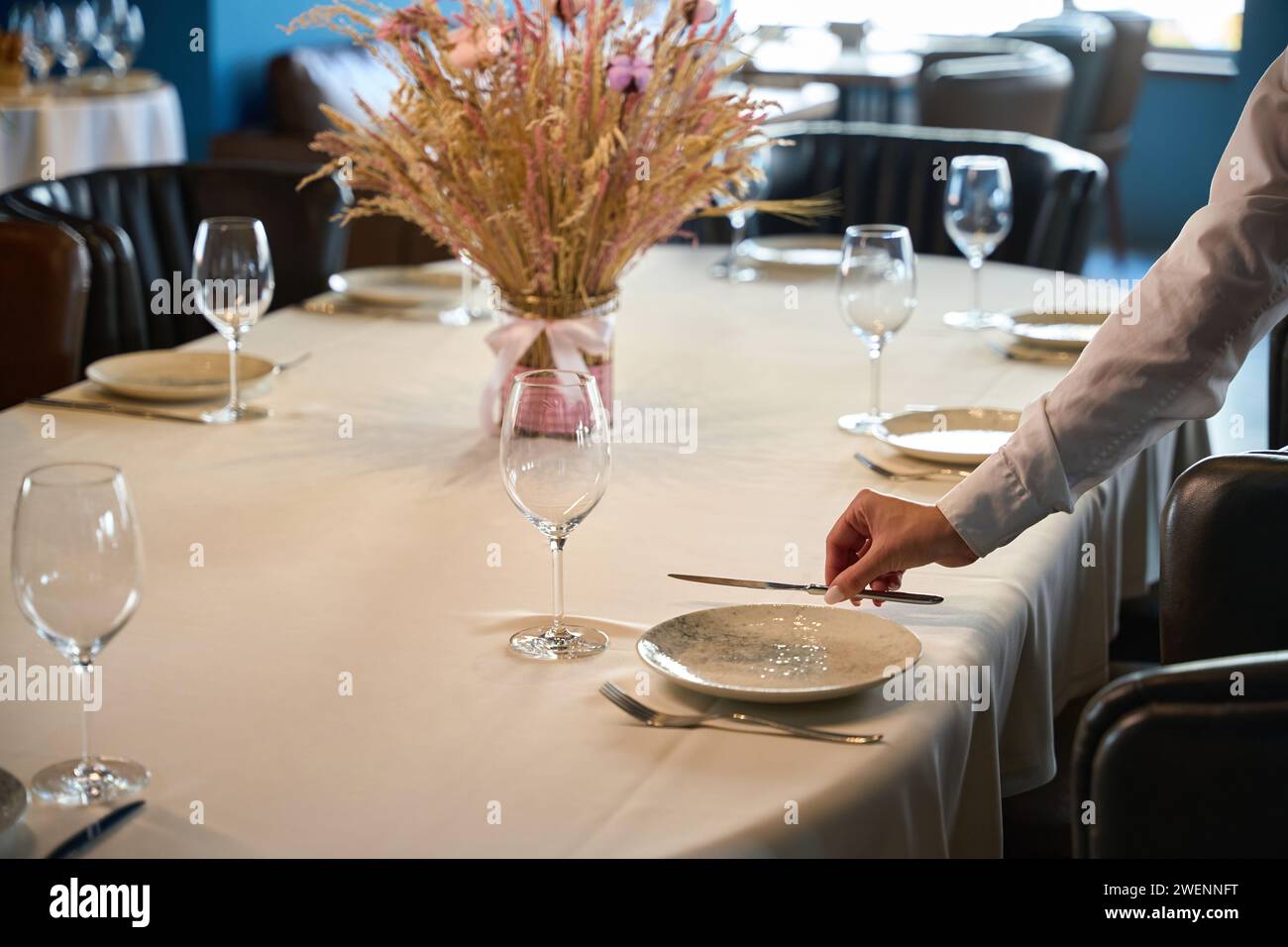 Waiter waitress setting up hi-res stock photography and images - Alamy