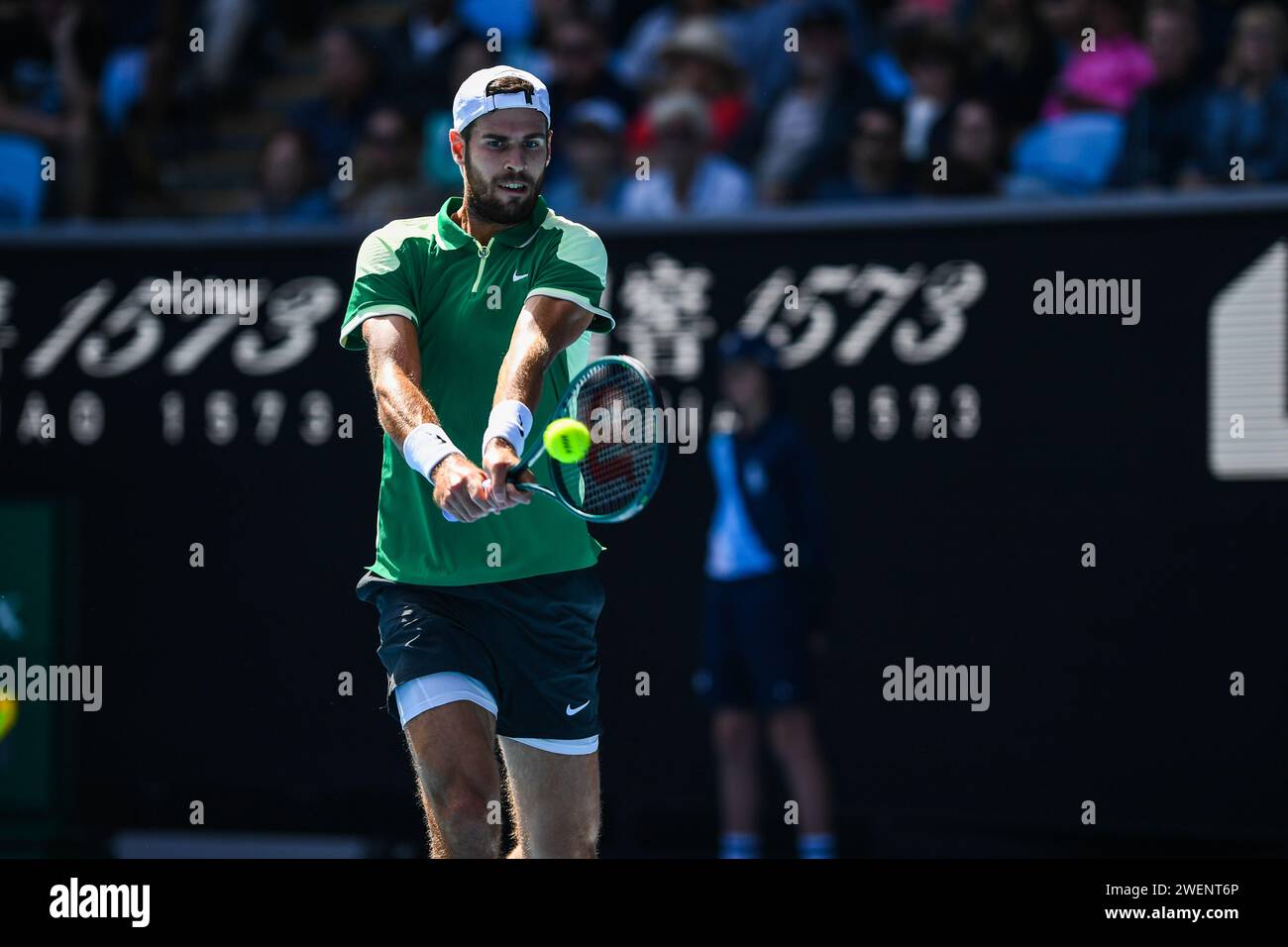 Melbourne, Australia. 21st Jan, 2024. Karen Khachanov of Russia plays against Jannik Sinner of ...
