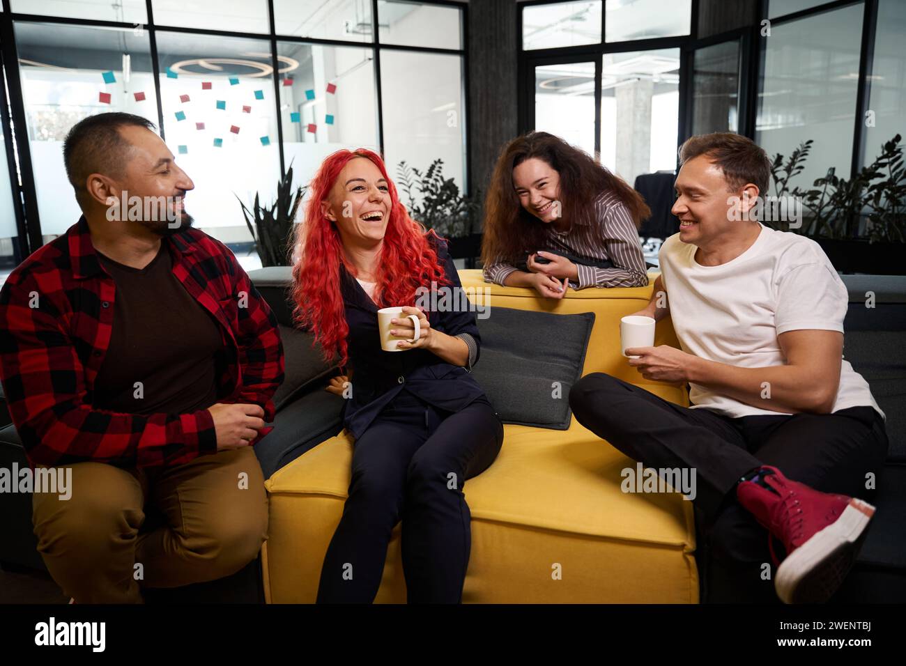 Friendly group of employee having fun during coffee break Stock Photo ...