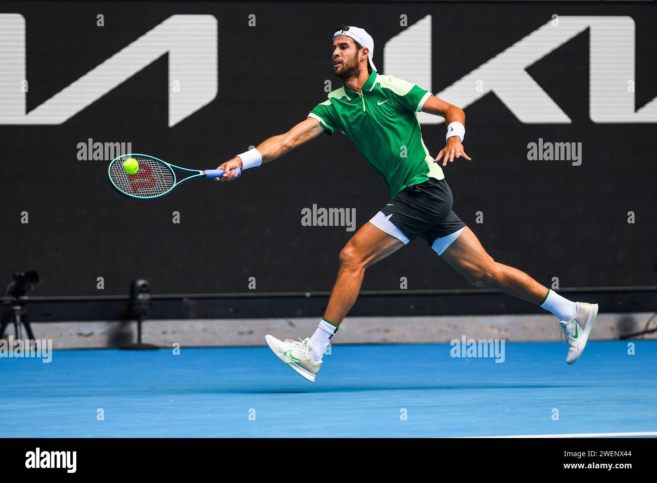 Melbourne, Australia. 21st Jan, 2024. Karen Khachanov of Russia plays against Jannik Sinner of ...