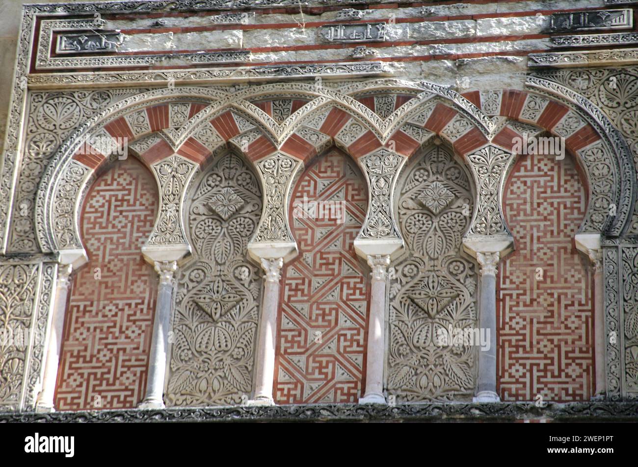 Cordoba, Andalusia, Spain. Arches on the outside of the Mosque. La ...
