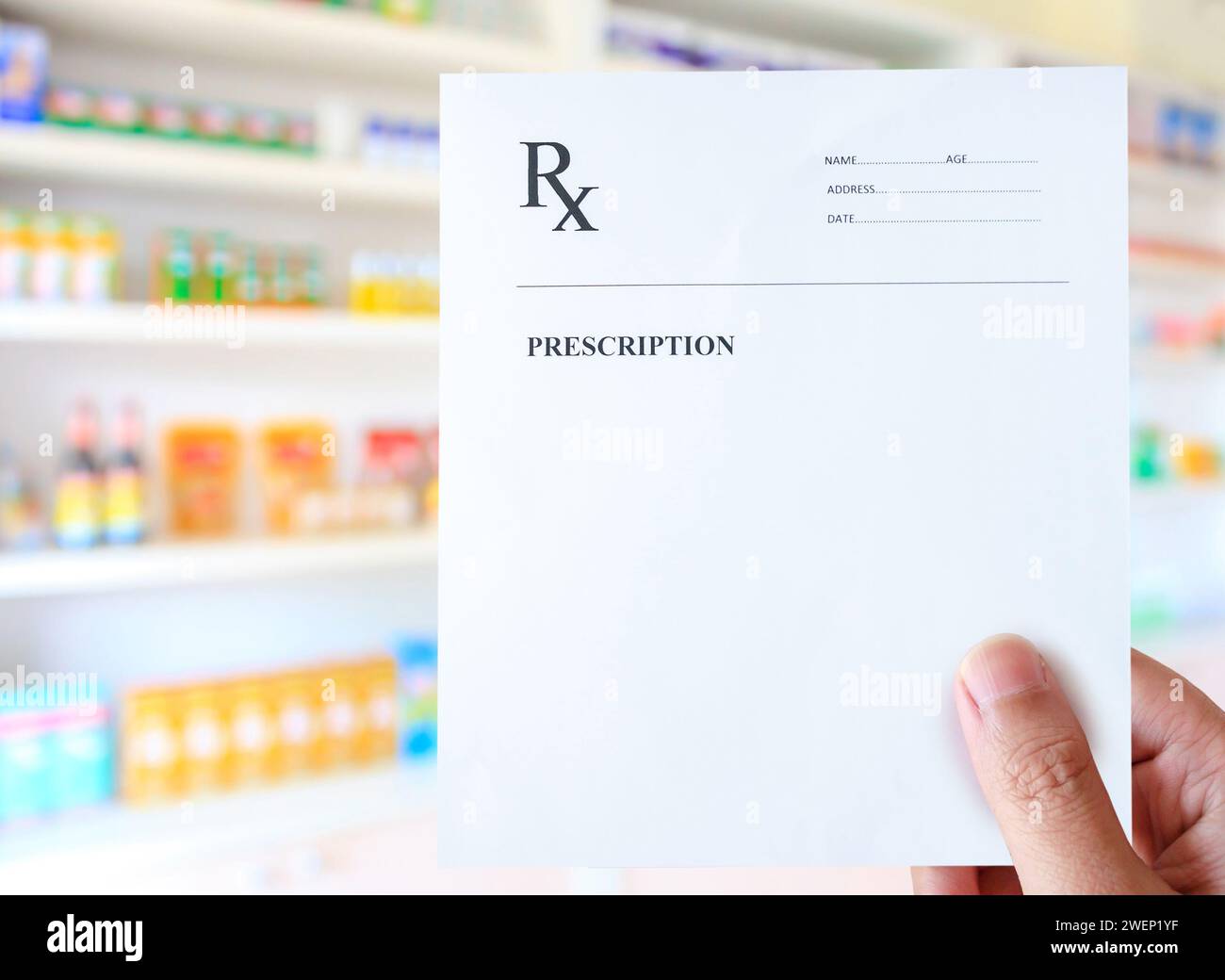 pharmacist hand with prescription paper in the pharmacy Stock Photo - Alamy