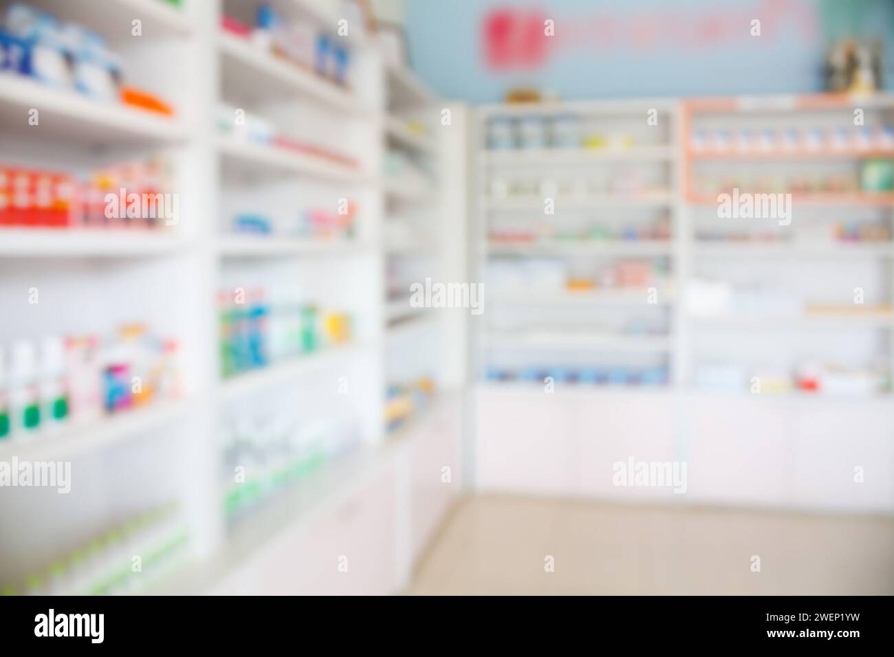 pharmacy shelves filled with medication blur background Stock Photo - Alamy