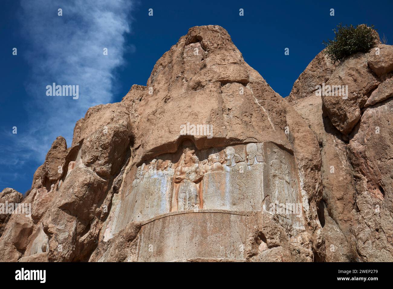 Rock relief of Persian king Bahram II and his royal family carved over ...